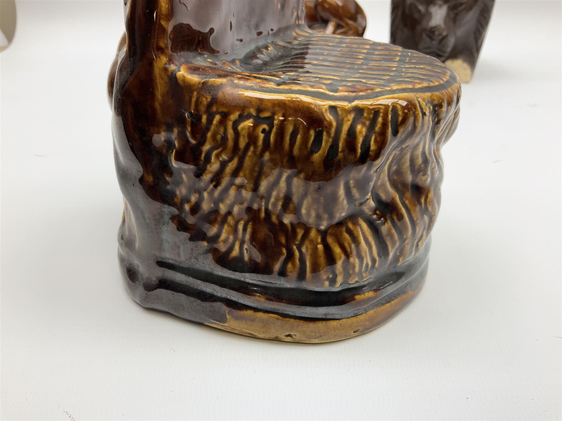 Two 19th century treacle glaze furniture/sash window rests modelled as ...