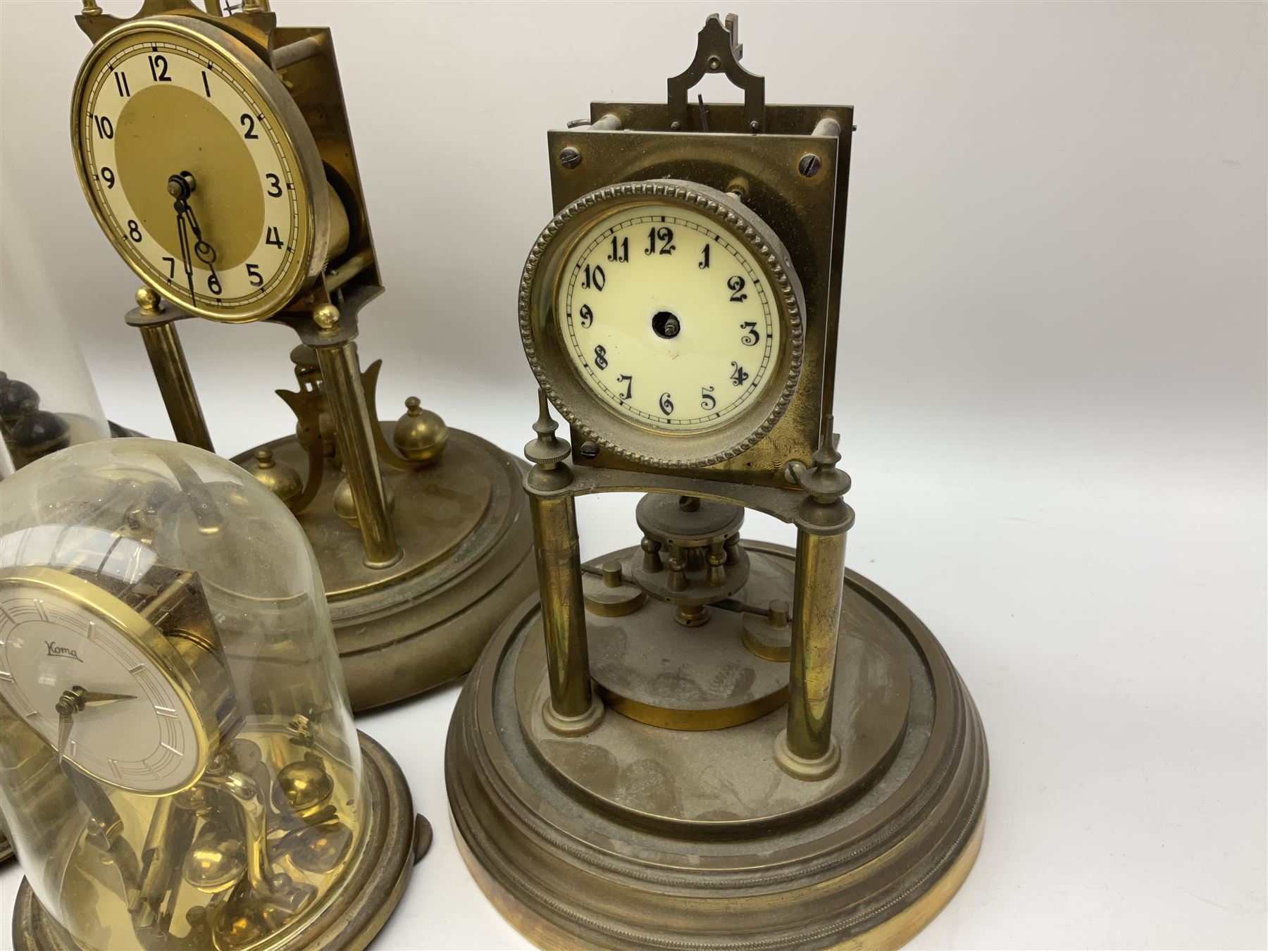 An assortment of 400-day torsion clocks for repair or spare parts ...