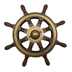 Brass bound teak ship's wheel with eight turned spokes and brass hub ...