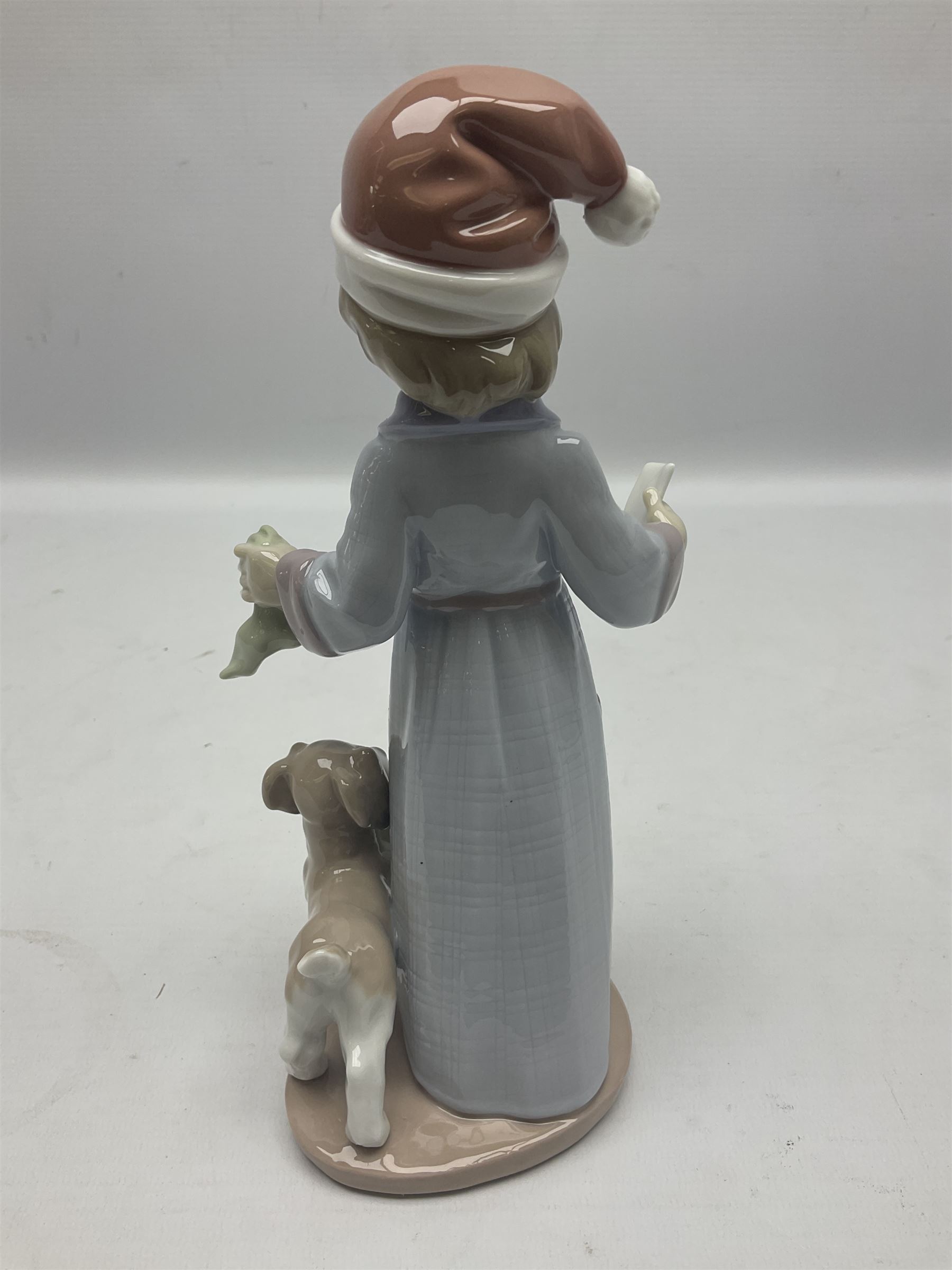 Lladro figure, Dear Santa, modelled as young boy in dressing gown and ...