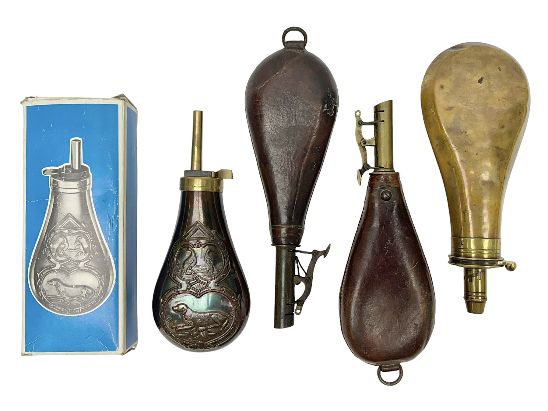 Two brass mounted leather shot flasks with thumb action nozzles; Dixon ...