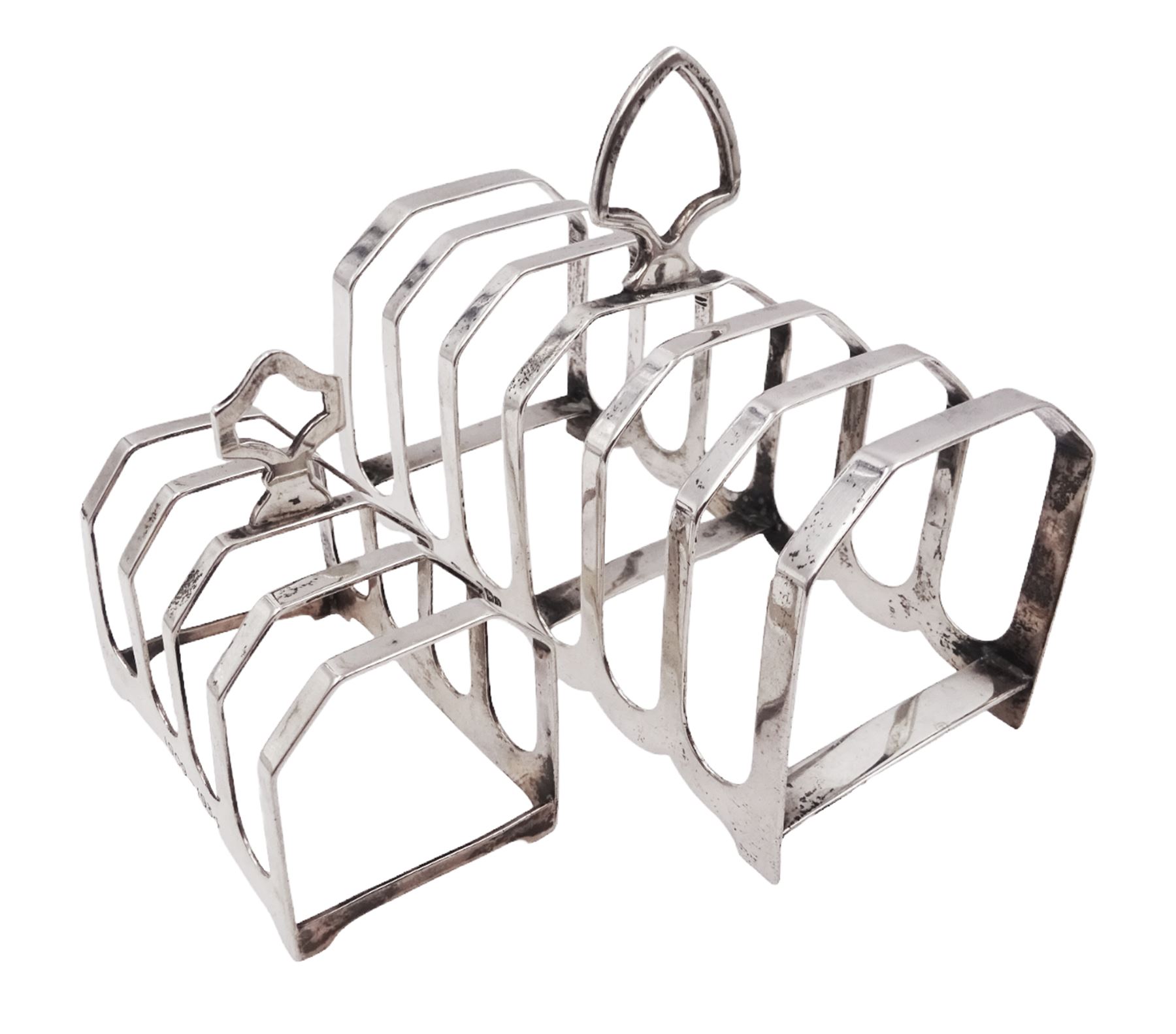 1930s silver seven bar toast rack, with angular bars and loop handle ...