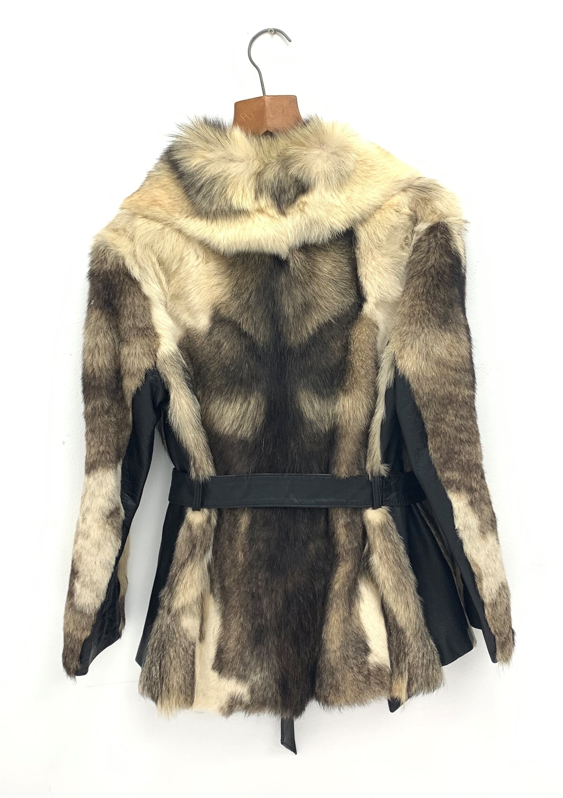 A lined Ocelot fur jacket with leather trim and belt. - Decorative ...