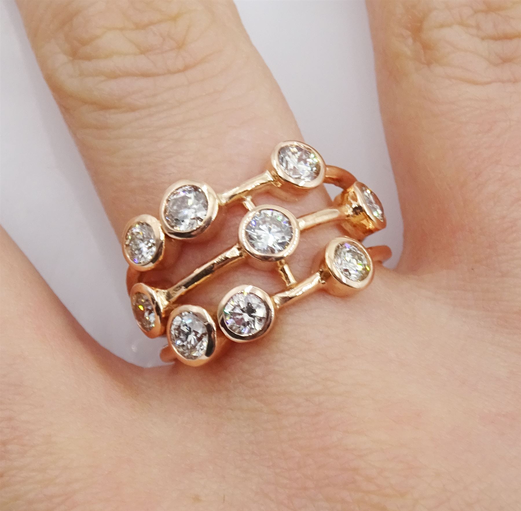 Rose gold nine stone round brilliant diamond contemporary design ring ...