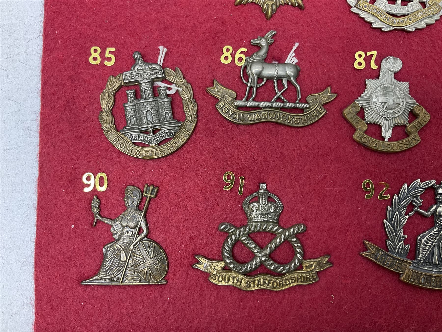 Twenty-two glengarry and cap badges including Argyll & Sutherland ...