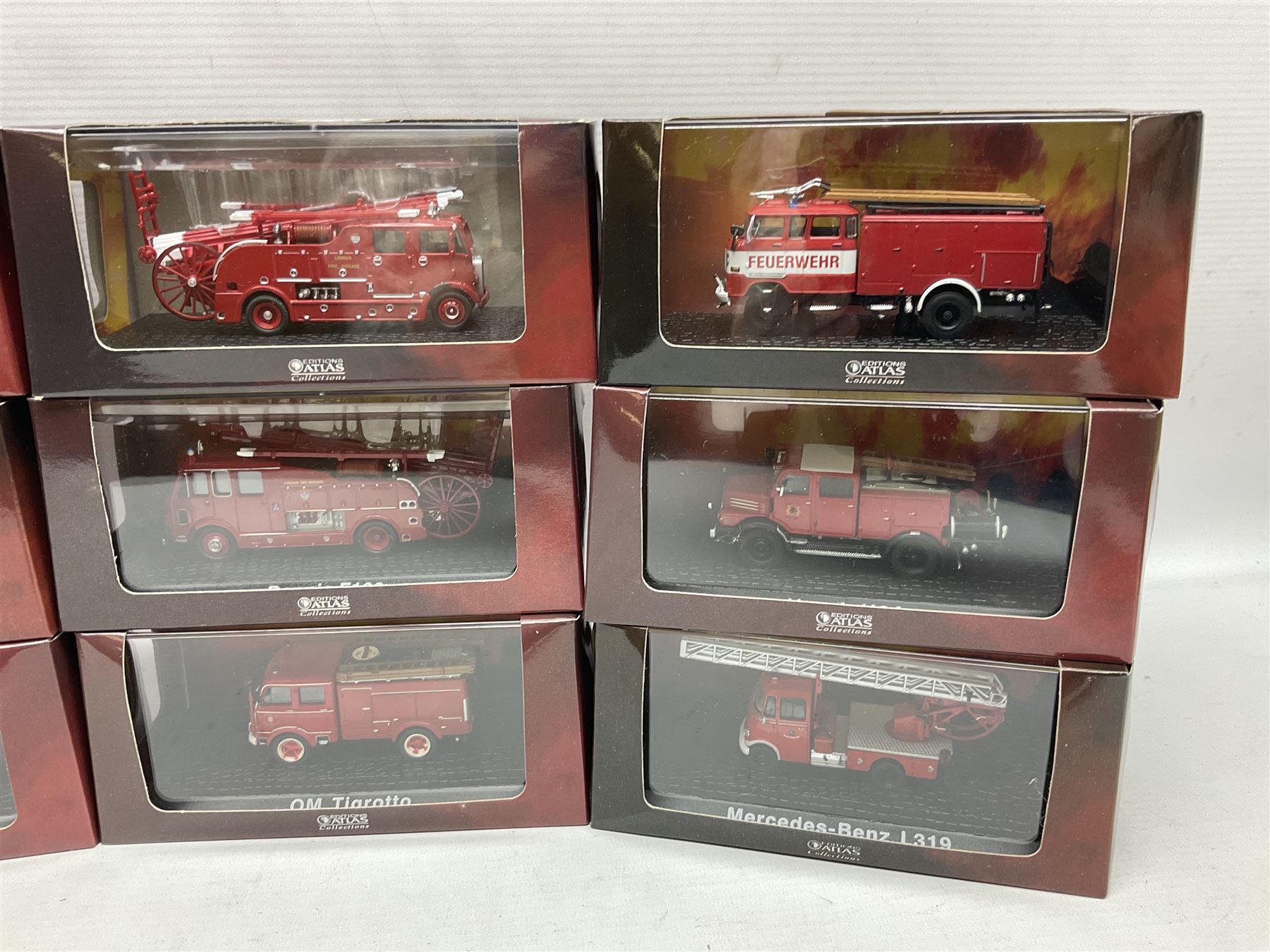 Twenty-six Atlas Editions Classic Fire Engine series die-cast models ...