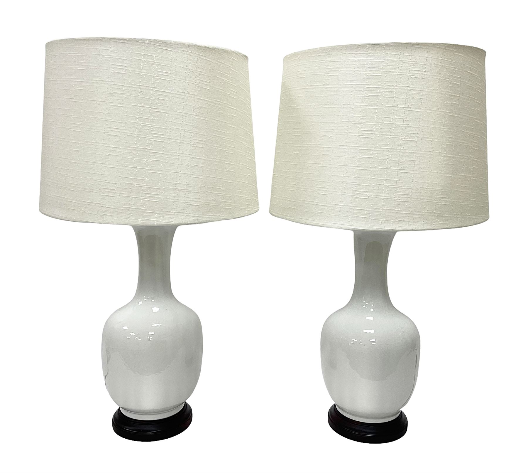 Pair of Chinese ivory crackle glazed table lamps, each of bottle form ...