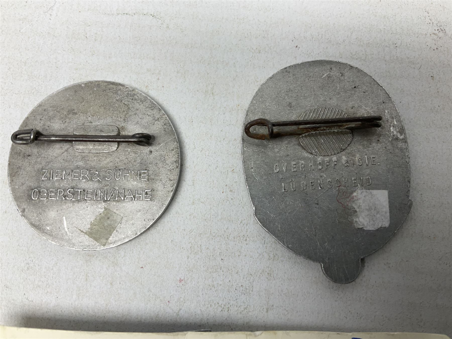 Two WW2 German 'tinnie' badges - Labour Day 1935 by Overhoff & Cie ...