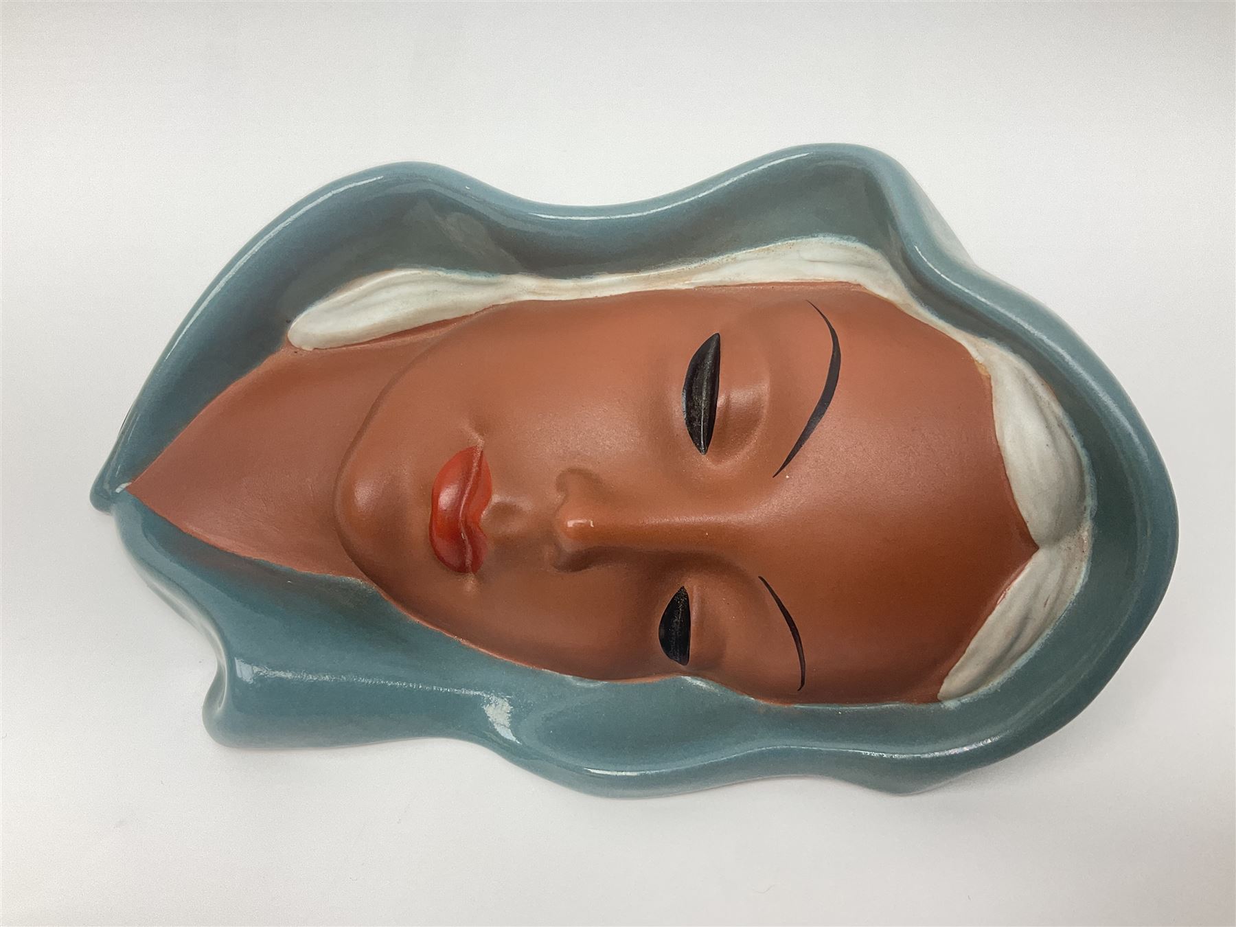 Art Deco Goldscheider terracotta face wall plaque, modelled as a woman ...