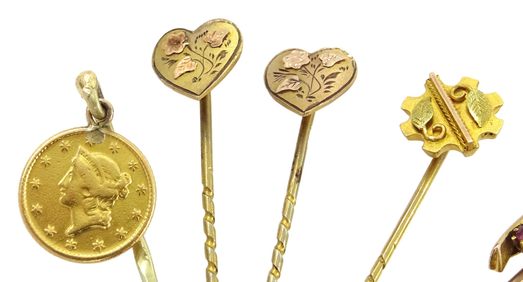 Seven Victorian and later gold stick pins including two hearts ...