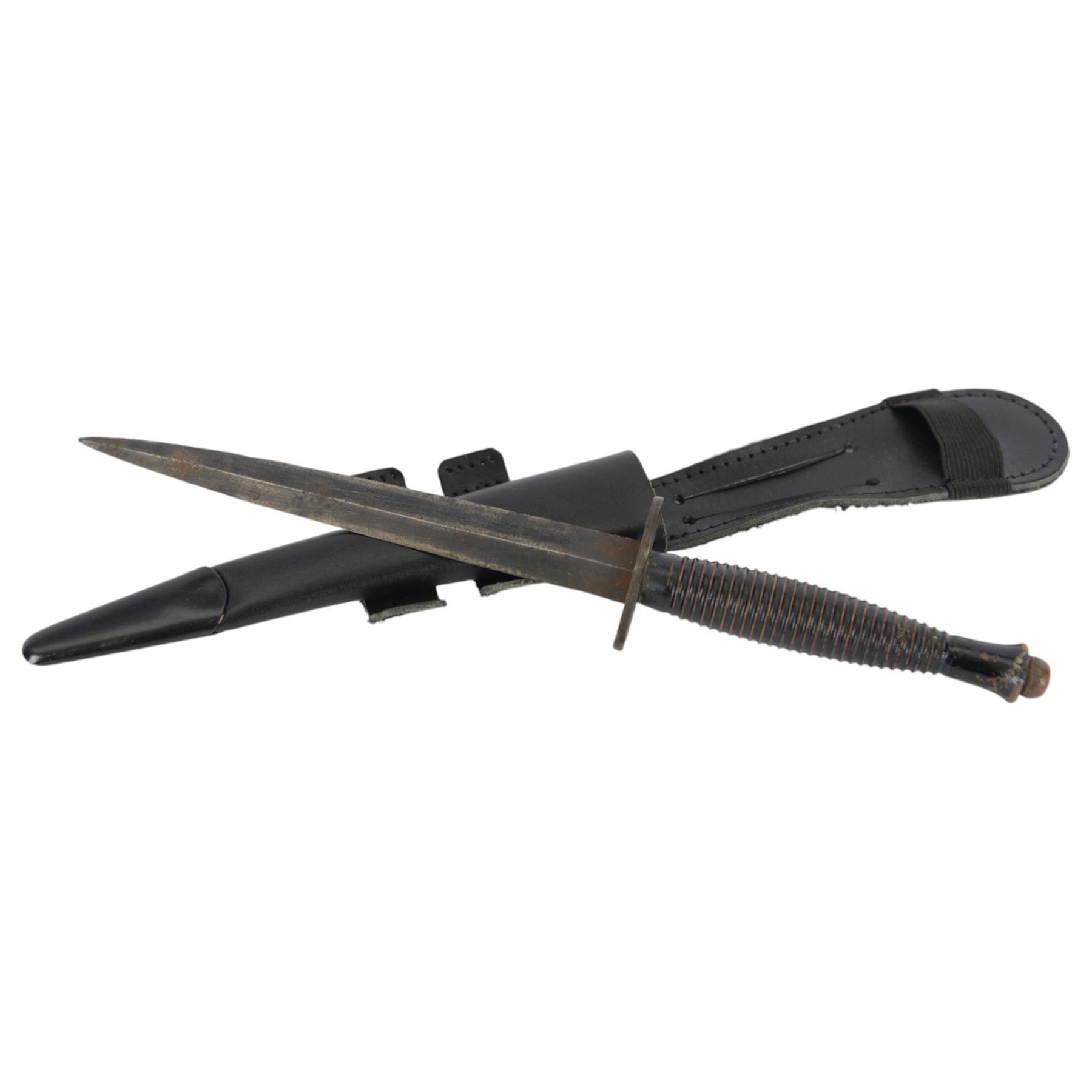 British commando knife, with ribbed ebonised steel hilt with a blued ...