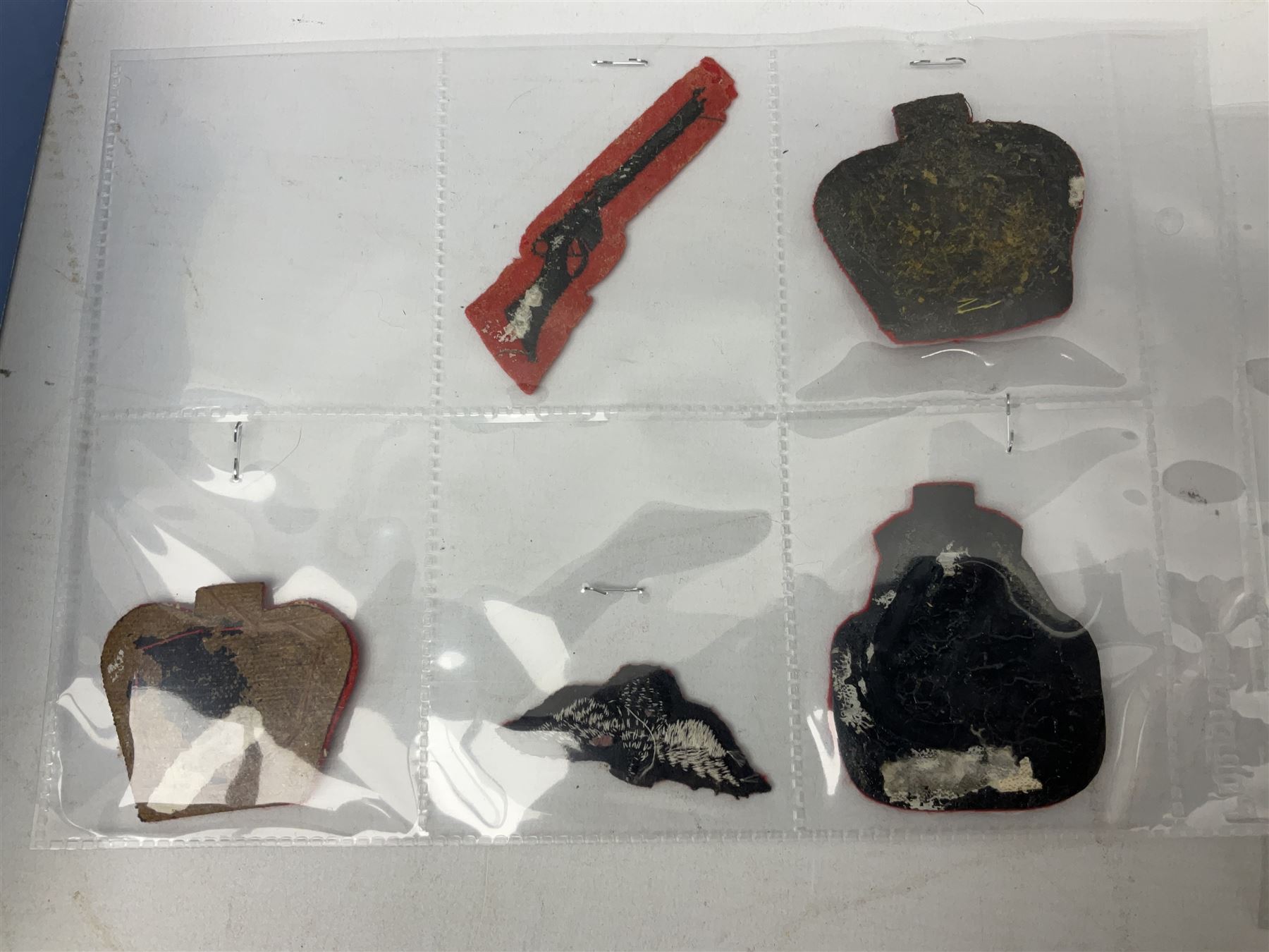 Large quantity of military embroidered cloth badges including shoulder ...