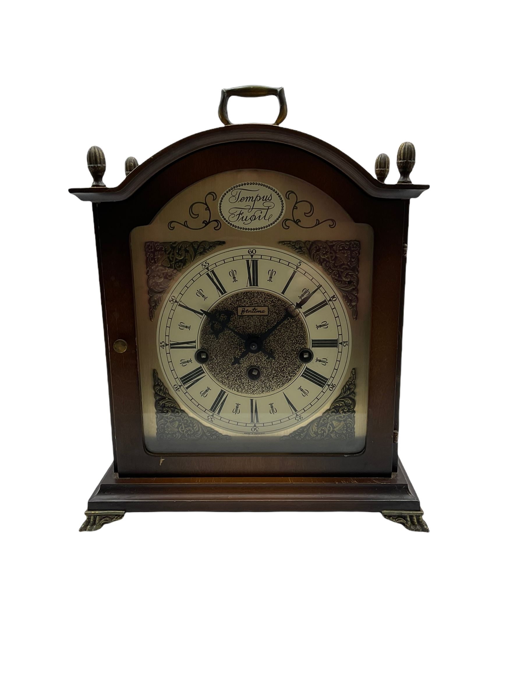 A Late 20th Century Westminster Chiming Mantle Clock Chiming The Hours a-late-20th-century-westminster-chiming-mantle-clock-chiming-the-hours