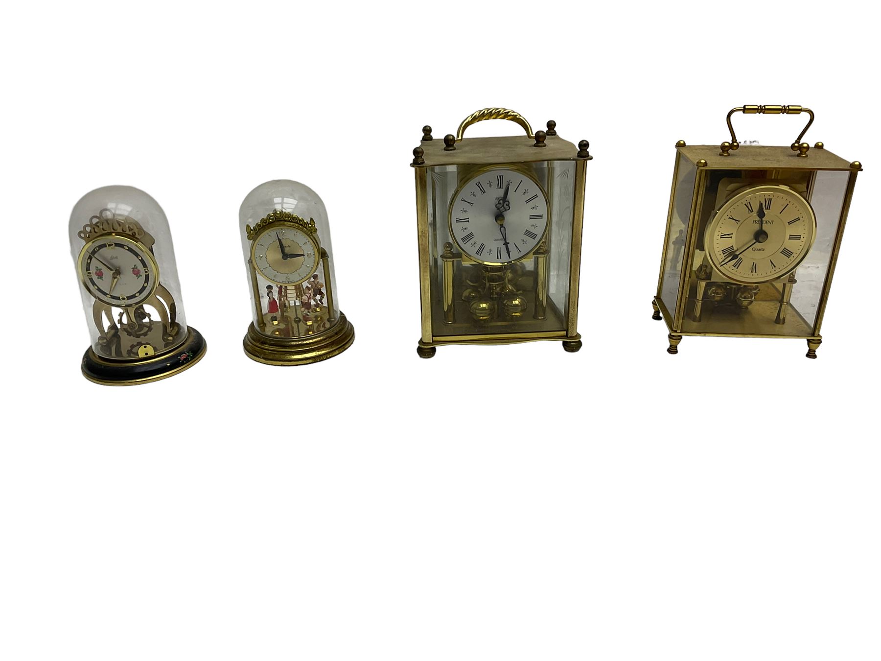 An assortment of six twentieth century mantle clocks and torsion clocks ...
