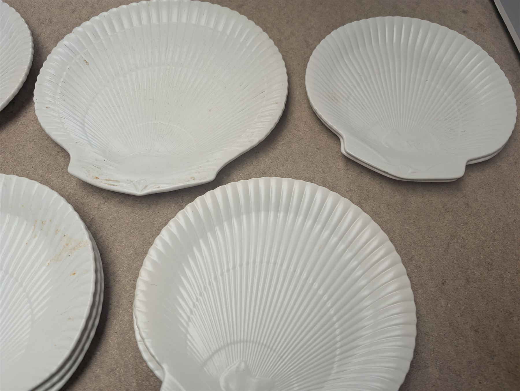 Wedgwood scallop shell plates, in white glaze, with printed marks ...