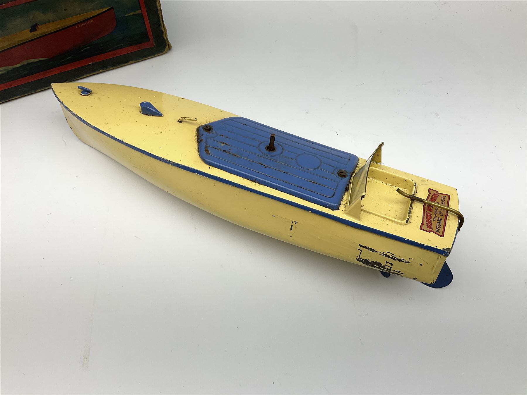 A boxed Hornby clockwork Speed Boat in cream and blue. - Decorative ...