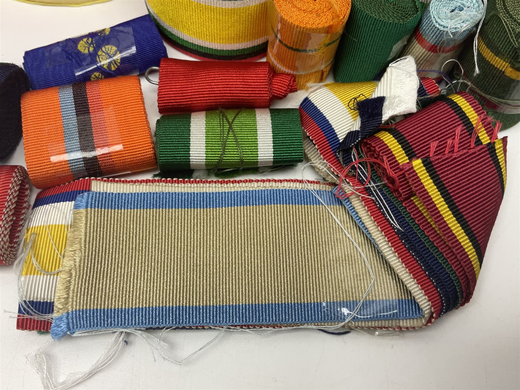 Quantity of modern medal ribbons in various length rolls and strips ...