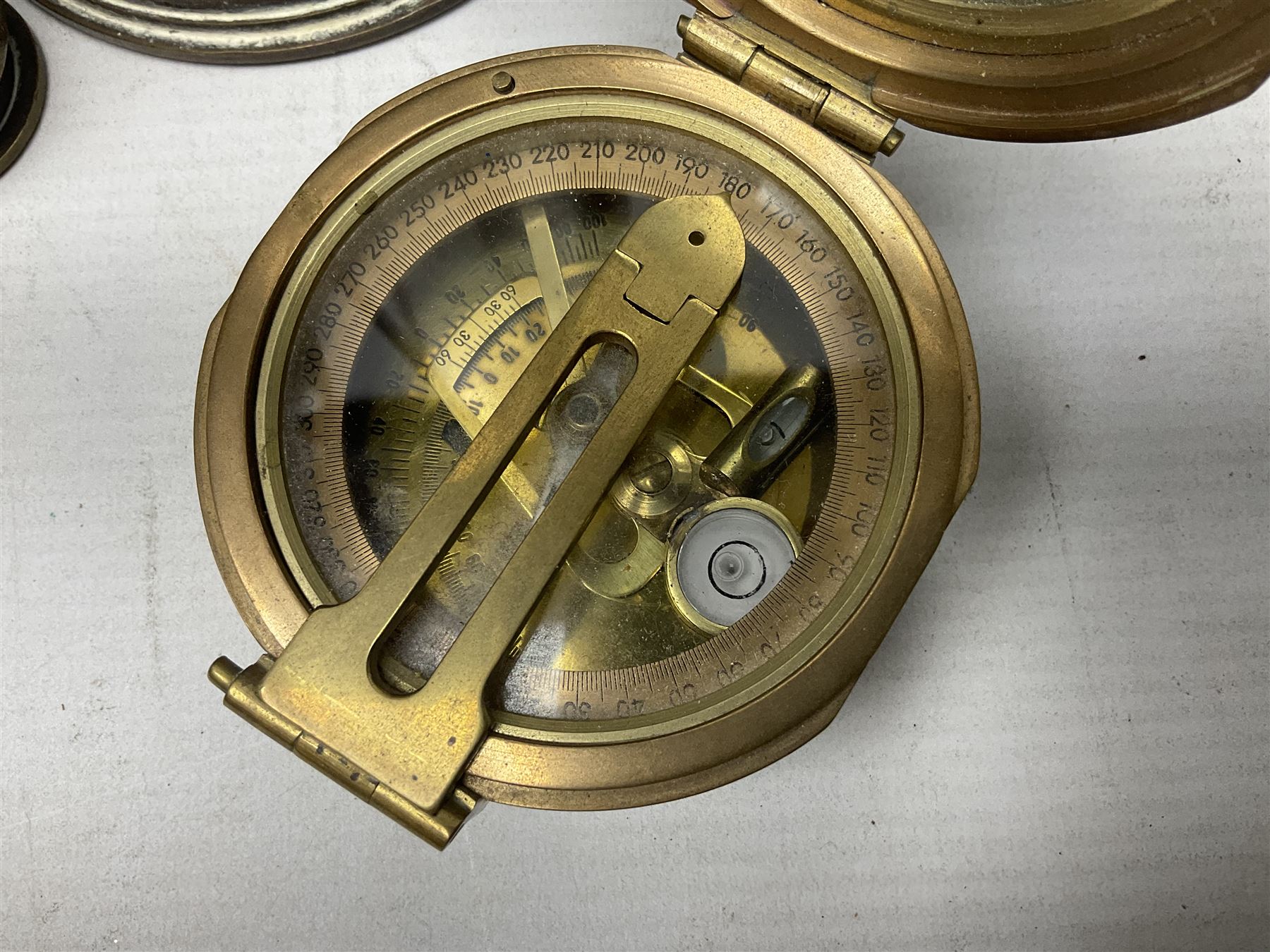 Reproduction brass pocket sextant, in circular drum shaped case ...