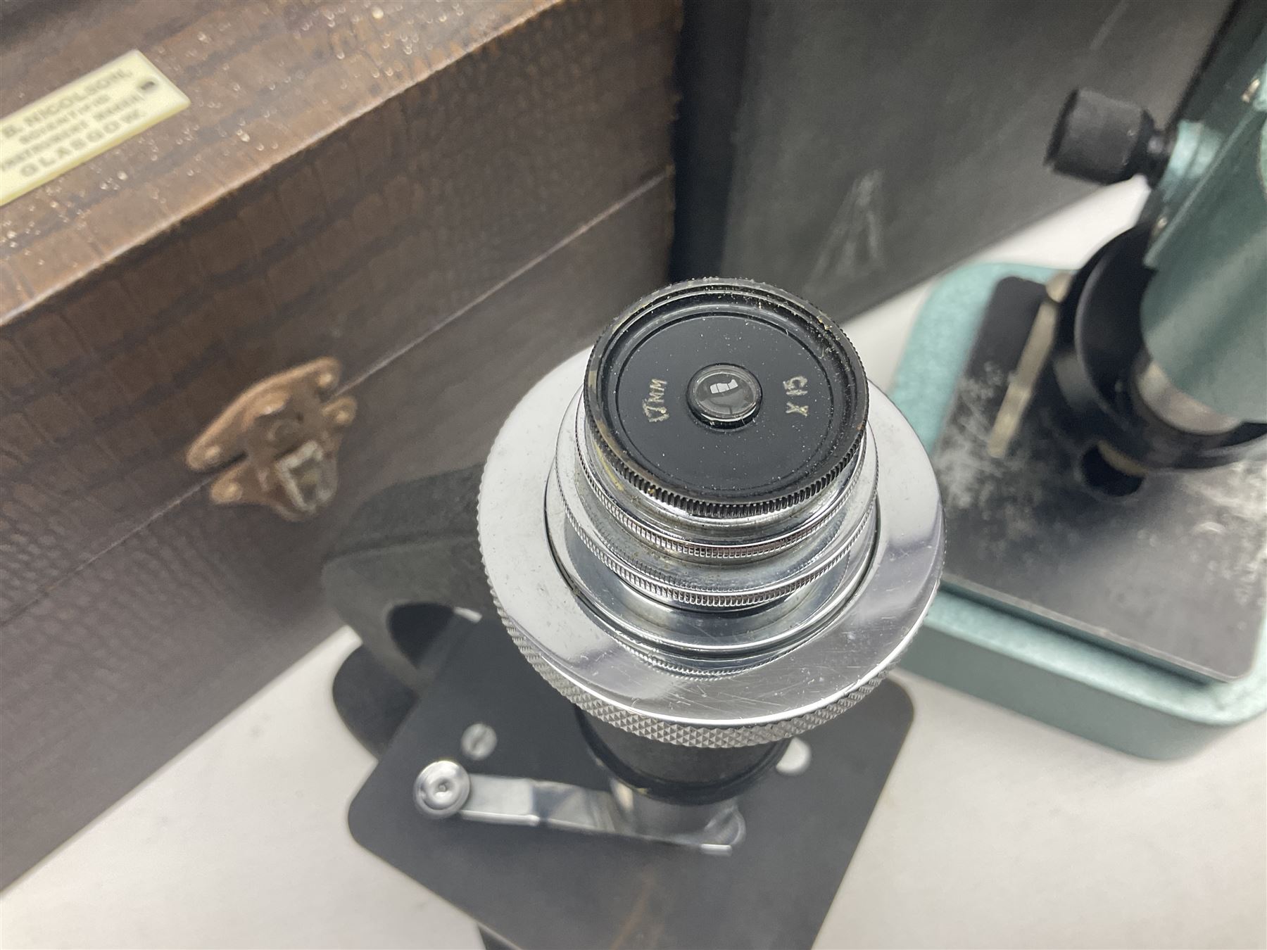 Four microscopes, comprising Beck Simple X no 1681, C Baker no 2929, C ...