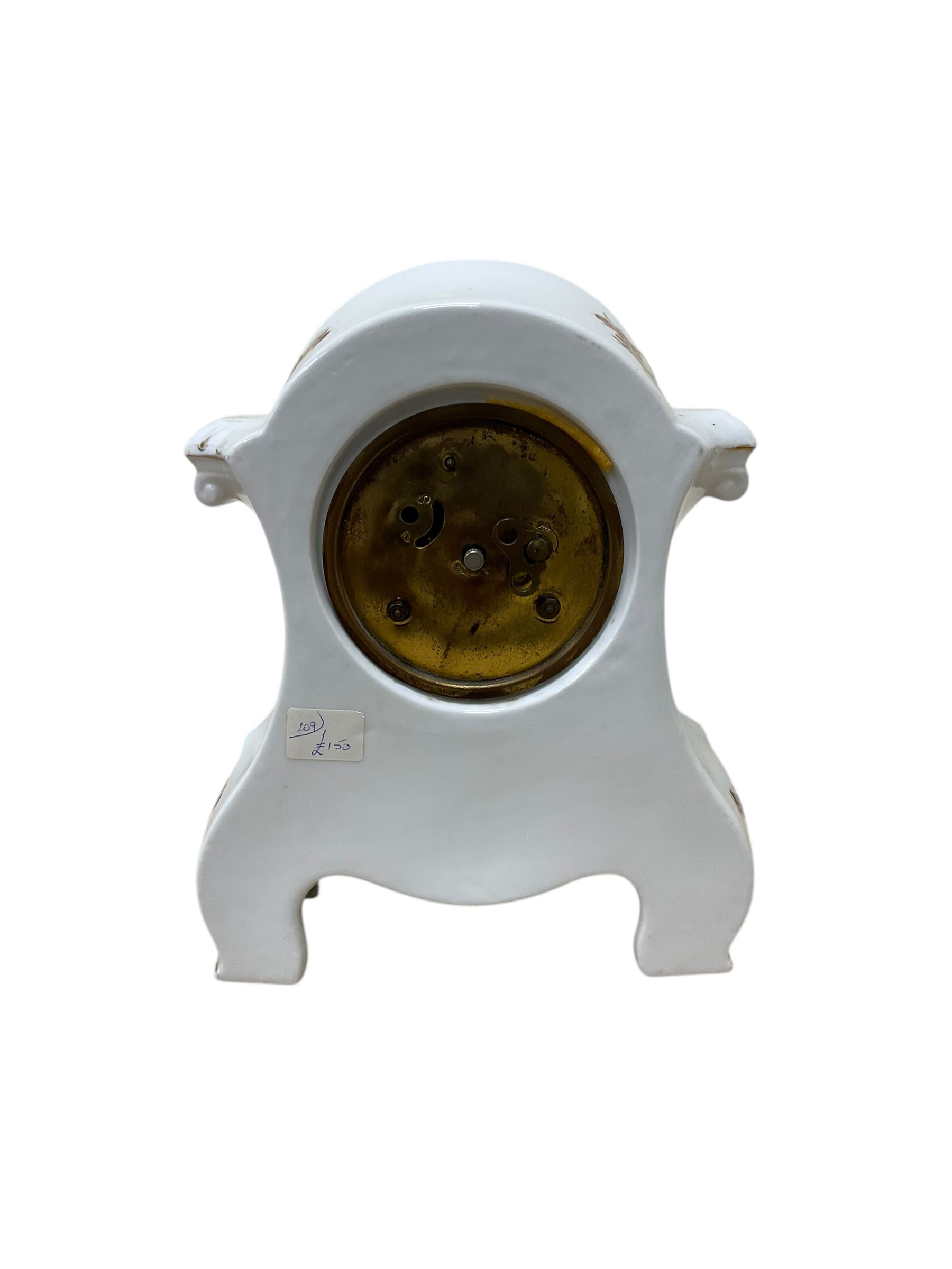 German-Porcelain 8-day spring driven timepiece mantle clock with cherub ...
