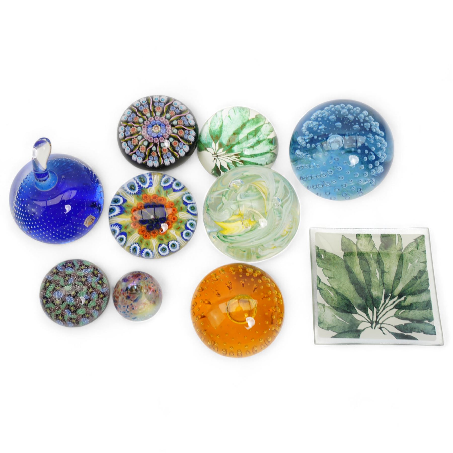 Group of nine glass paperweights, including a Murano example and a ...