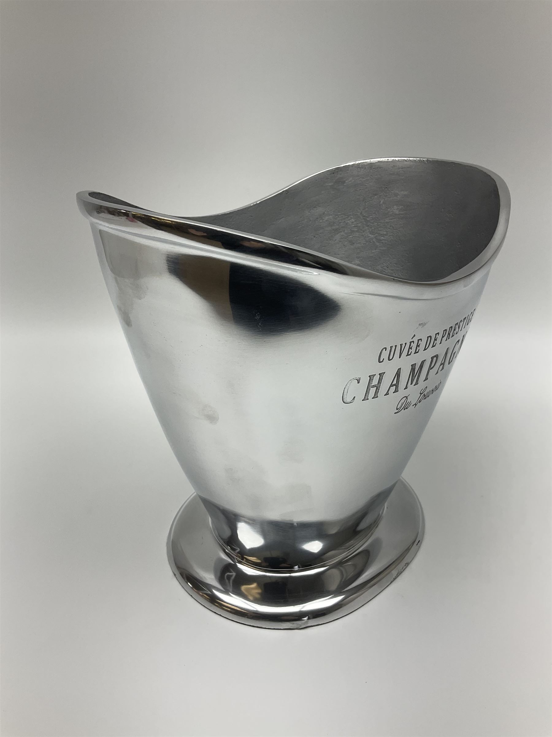 Polished aluminium Champagne bucket inscribed 'Cuvee de Prestige ...