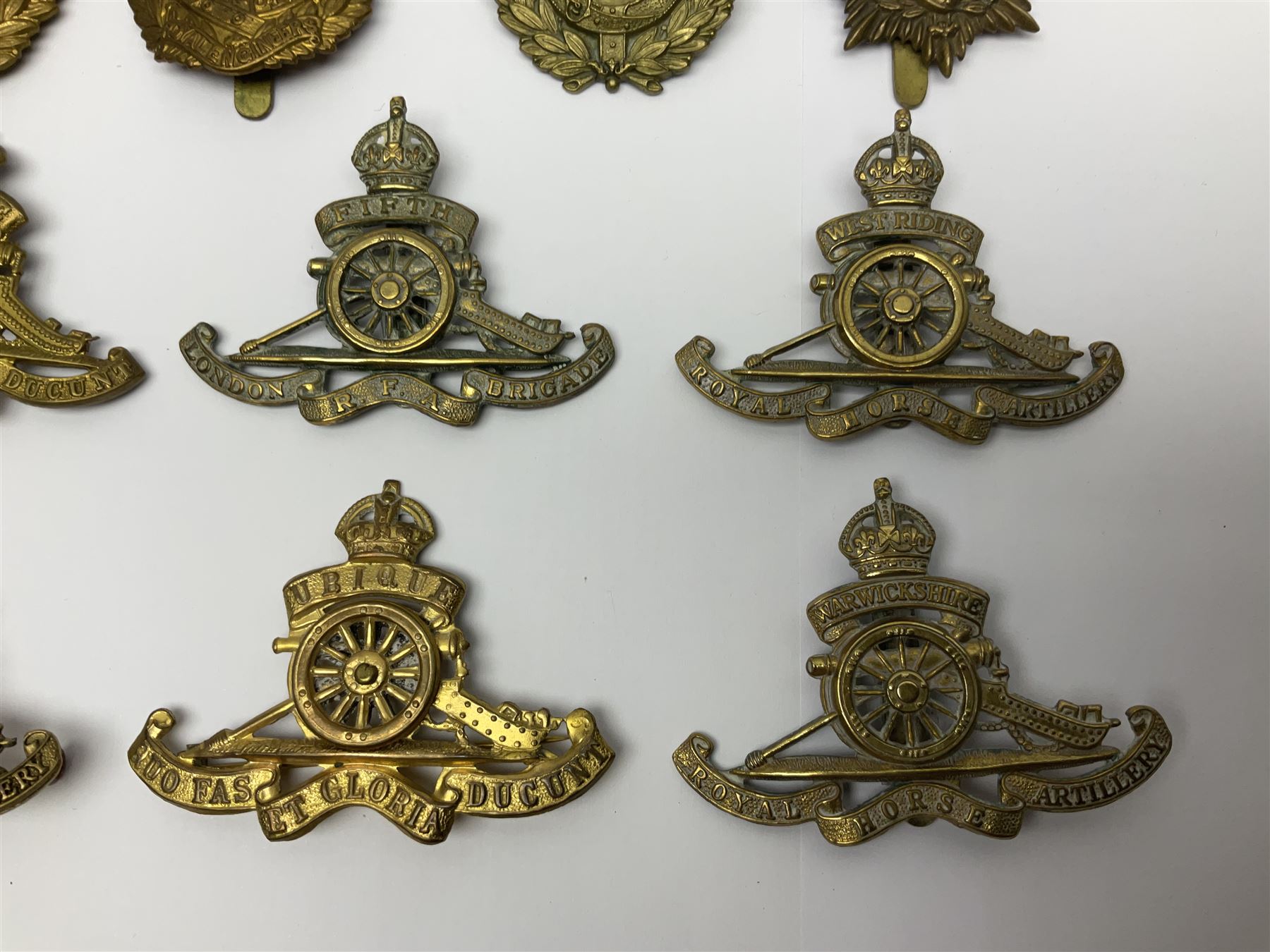 Twelve cap badges including Royal Artillery | Militaria | 94433