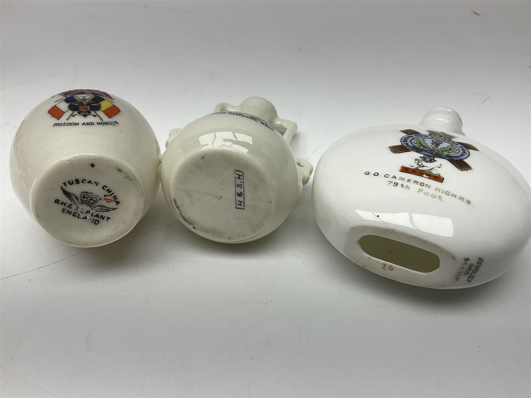 Eighteen WW1 crested china military models including artillery shells ...
