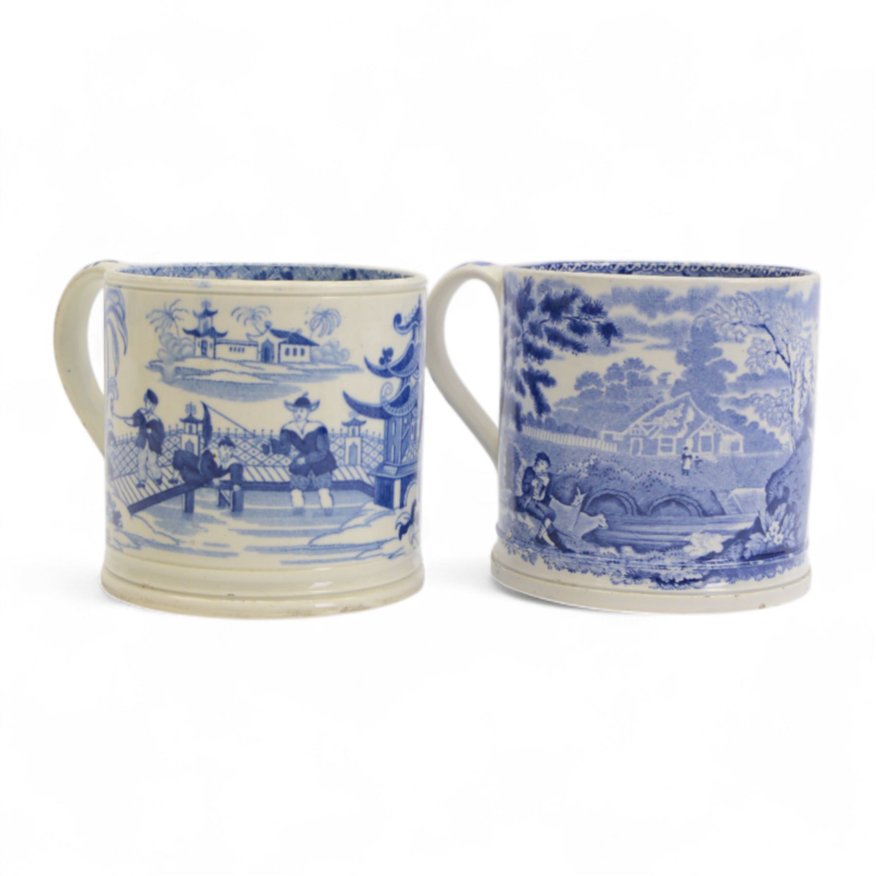 Two large 19th century blue and white transfer decorated pearlware mugs ...