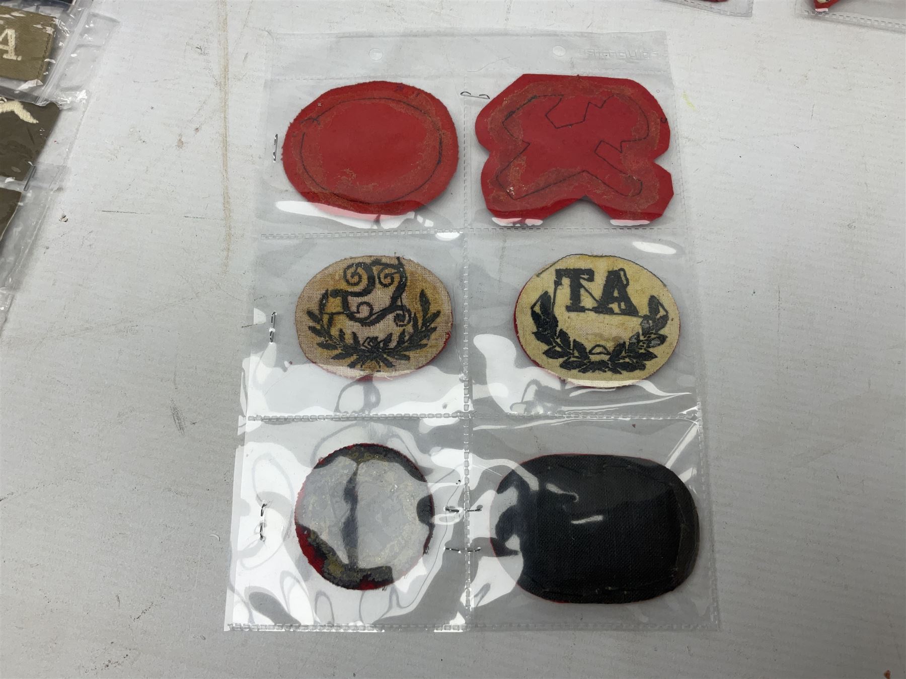 Large quantity of military embroidered cloth badges inc Militaria 65393