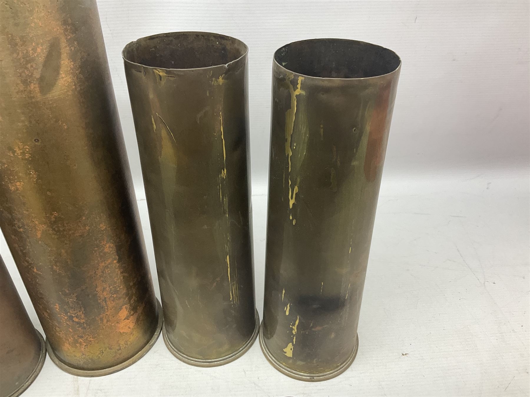Eight WW1/WW2 and post-WW2 plain brass shell cases, tallest H37cm ...