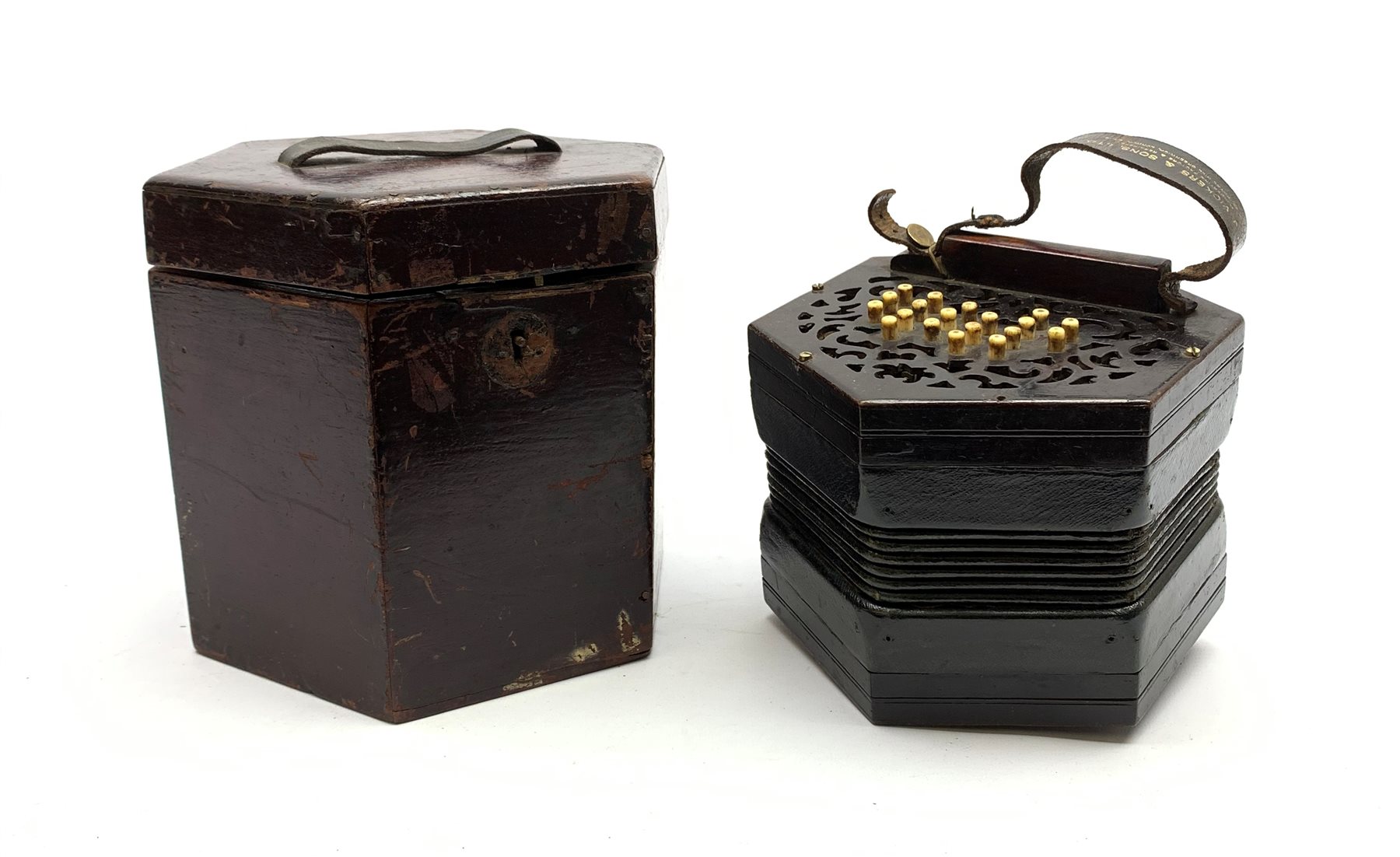 19th century rosewood concertina of hexagonal form with fretworked ends ...