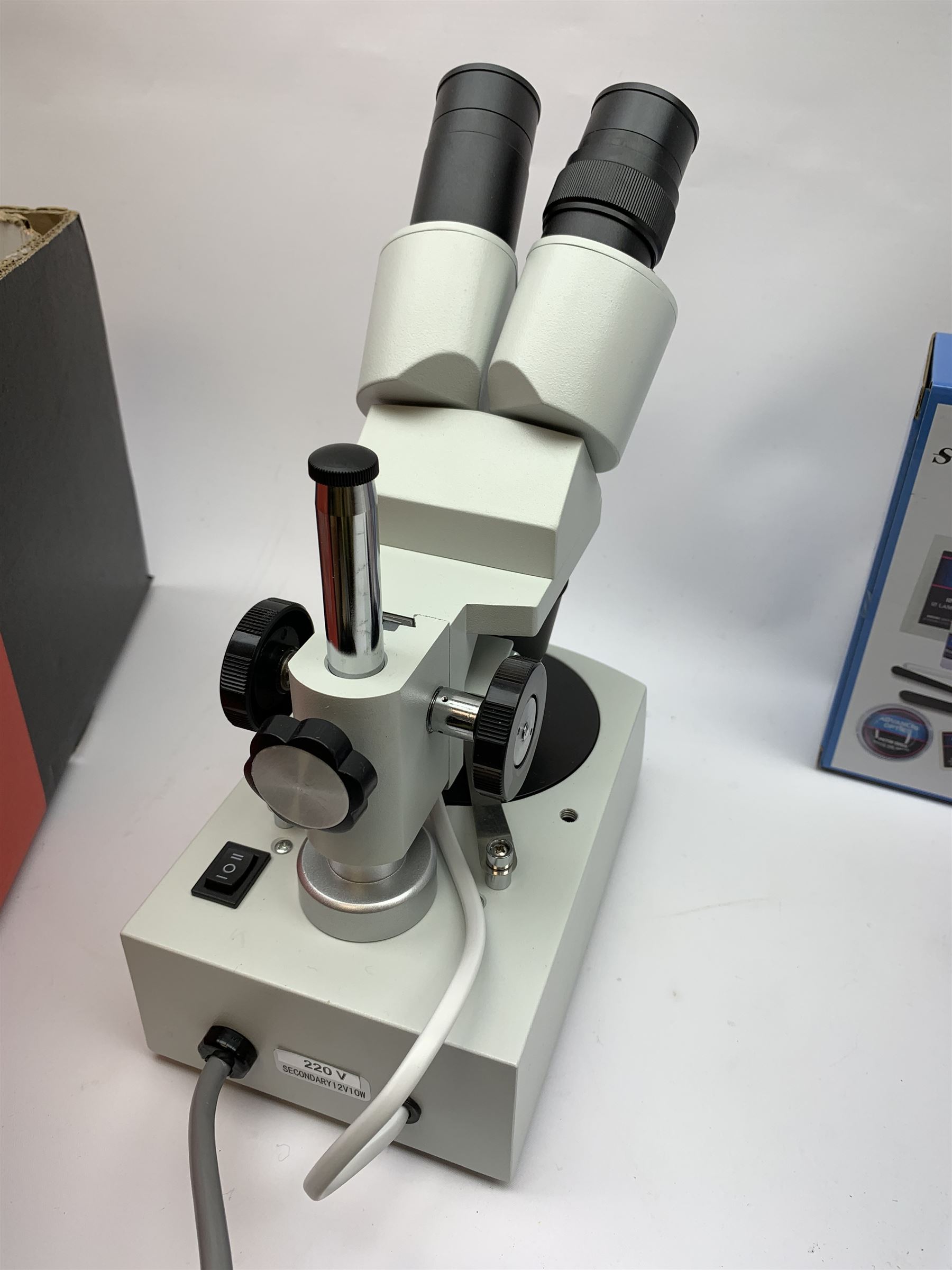 AmScope microscope, with various eyepieces and other accessories ...